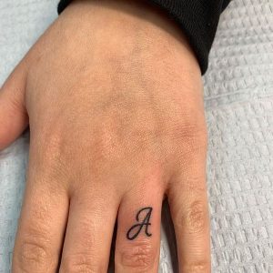 Exploring the Art of Letter A Tattoos: Simple to Regal Designs