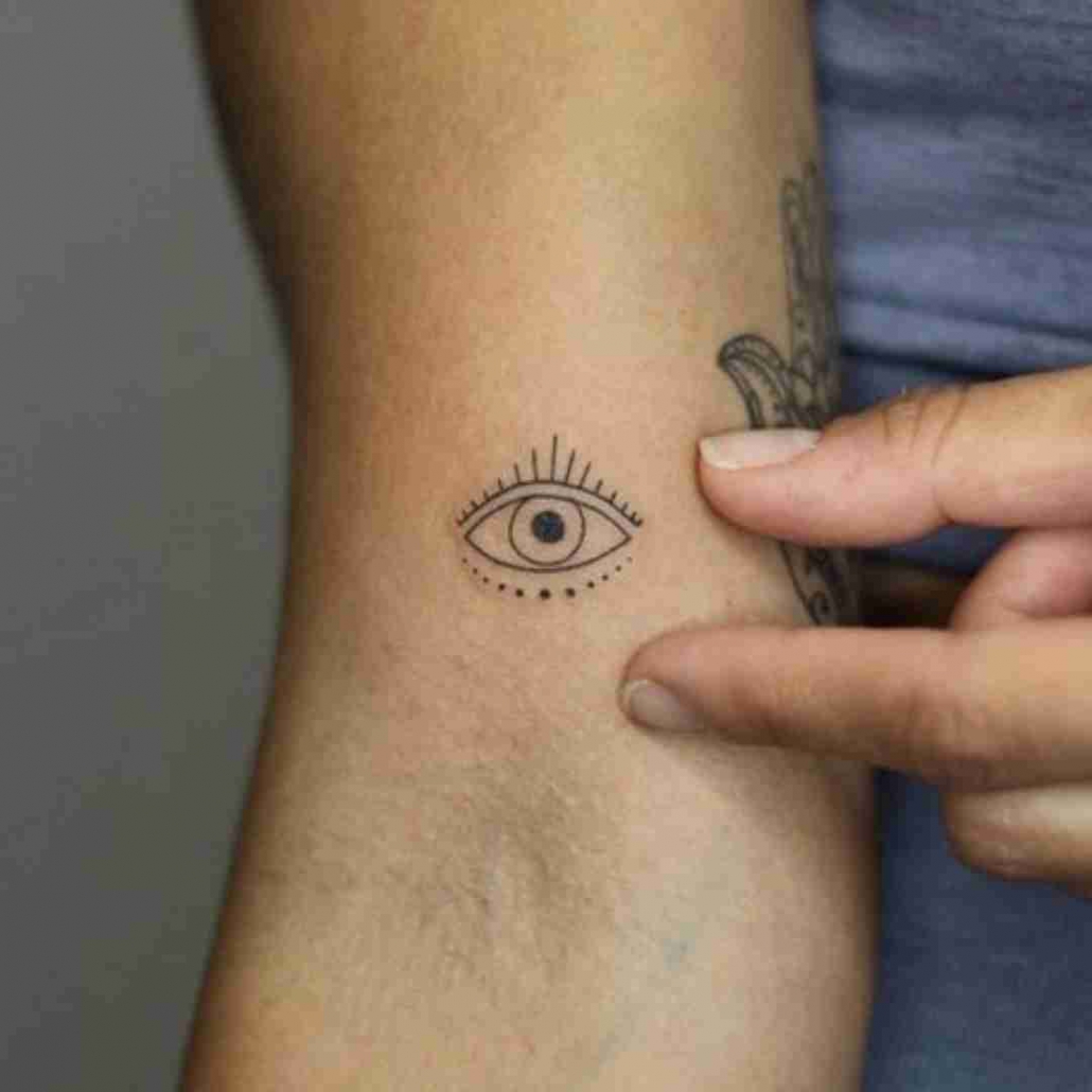 Exploring Small Evil Eye Tattoos: Symbols of Protection and Beauty