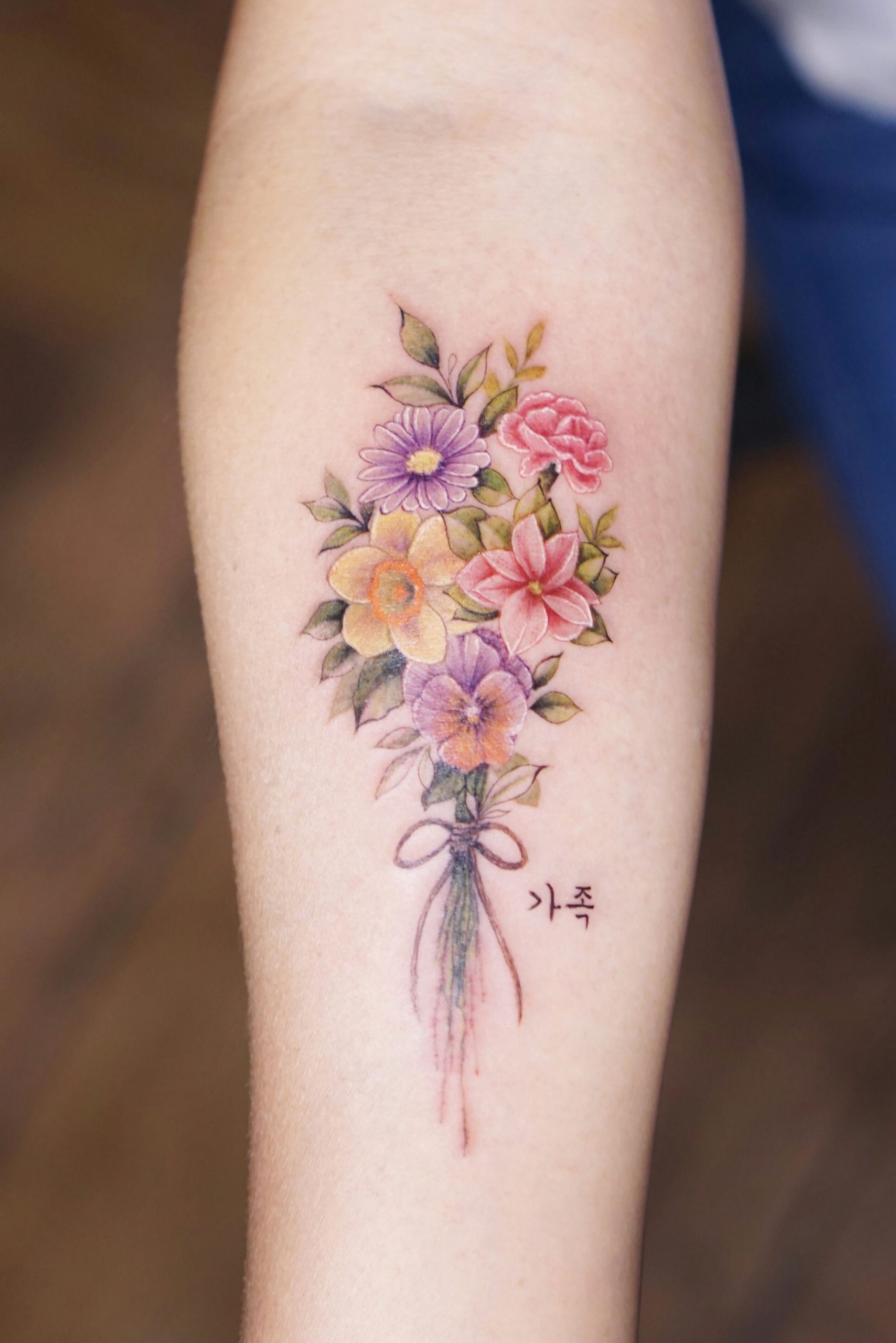 Creative Flower Bouquet Tattoo Ideas for the Arm, Forearm, and Ribs ...
