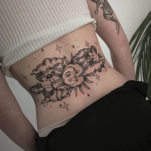 Lower back tattoo designs for women and men with meaning, flowers, and ...