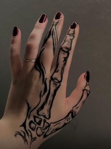 23 Skeleton Hand Tattoo Ideas 2025: Bold And Creative Designs For Women ...